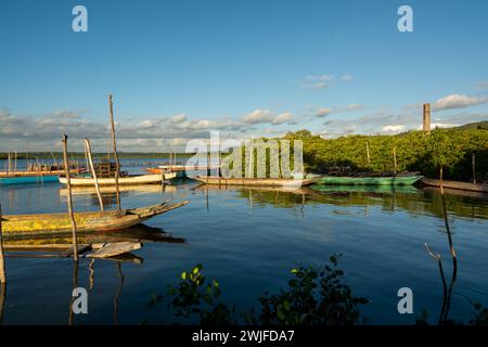 Canoes docked on a mighty river. Santiago do Iguape, Bahia Stock Photo ...