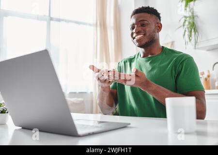 joyful deaf african american freelancer using sign language for ...