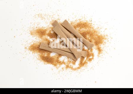 heap of sugar sticks, sugar in paper kraft packaging, mock up for ...