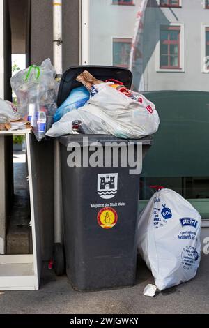 overfilled residual waste bin Stock Photo - Alamy
