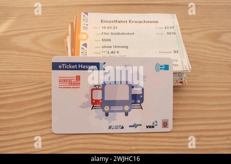 closeup electronic eTicket on table, monthly train, bus travel passes ...