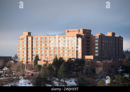 Sunrise on the Marriott Hotel, with the Rocky Mountains in the distance ...