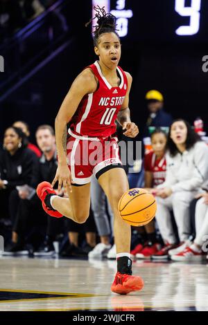 North Carolina State guard Aziaha James brings the ball up during the ...
