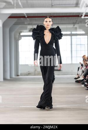 A model walks on the runway at the Badgley Mischka fashion show at New ...