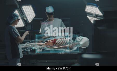 Male and female surgeons in AR headsets perform surgery in operating ...