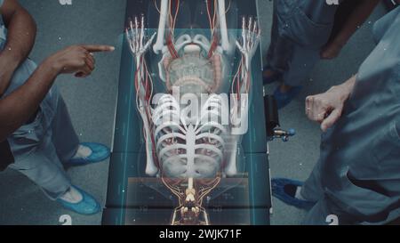 Multiethnic surgical team work in operating room using futuristic ...