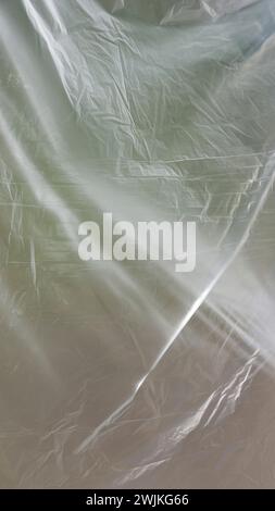 Transparent plastic sheet wrinkles background Stock Photo - Alamy