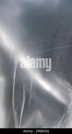 Transparent plastic sheet wrinkles background Stock Photo - Alamy