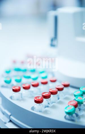 A close-up of vials with red and green caps Stock Photo - Alamy