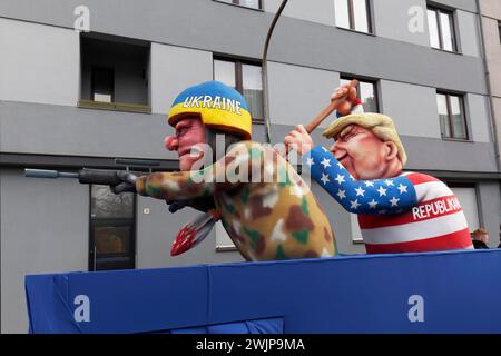 Donald Trump pierces a Ukrainian soldier with a spear, papier-mache ...