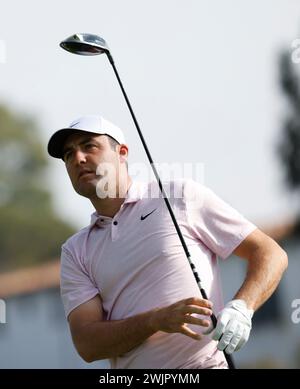 Scottie Scheffler hits his second shot on the 10th hole in the first ...