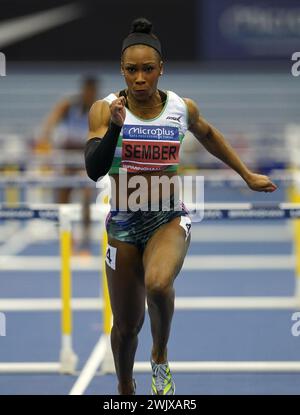 Cindy Sember on her way to winning the Women's 100m Hurdle Final during ...
