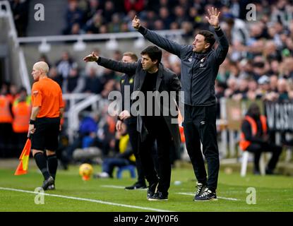 Bournemouth manager Andoni Iraola (centre right) speaks to the match ...