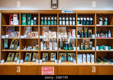 Varieties of Japanese liquor (Syuzou) on shelves at the Izumi Syuzou ...