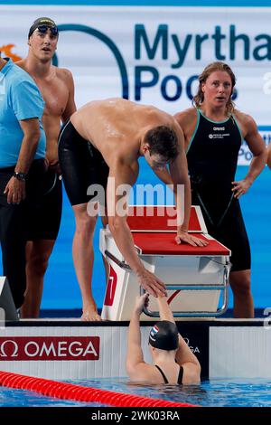 DOHA - Caspar Corbeau, Kira Toussaint and Nyls Korstanje after the 4 x ...