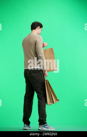 Fashion, food and consumer concept. Cheerful silly redhead woman ...