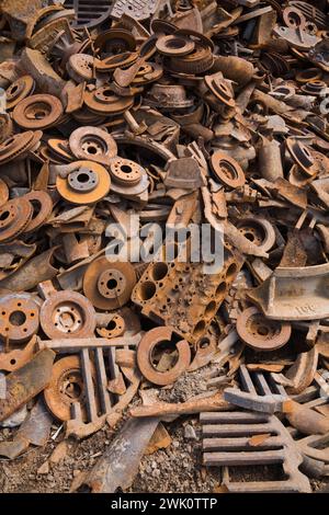 Pile of assorted rusted steel disc and drum brakes at scrap metal ...