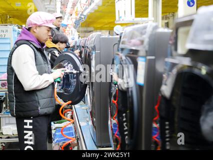 QINGDAO, CHINA - FEBRUARY 18, 2024 - Workers work on a production line ...