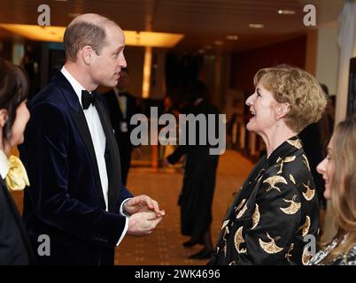 The Prince of Wales, president of Bafta, talks with Emma Baehr, (right ...