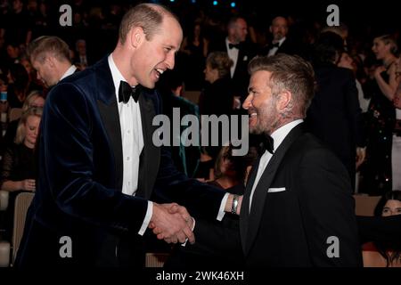 The Prince of Wales, president of Bafta, talks with David Beckham at ...