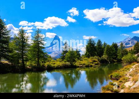 View of Grindji Lake (Grindjisee) and Matterhorn mountain at summer on ...