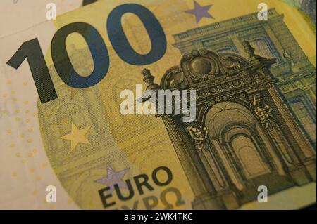 Fragment part of 5 euro banknote close-up with small brown details ...