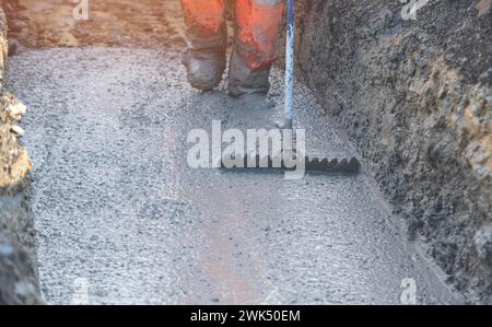 Concrete cast-in-place work. Builder level wet concrete. Concrete works ...