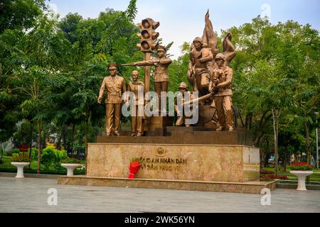 The golden Police and Fire Officer Statue in Thong Nhat Park, Hanoi ...