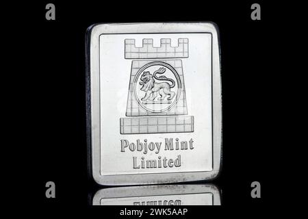 A Silver Ingot showing the Pobjoy Mint Limited trademark logo. The coin ...