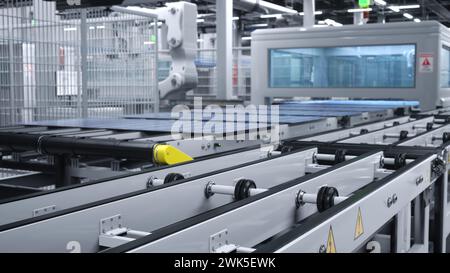 Automatized robotic arms in cutting edge solar panel warehouse handling ...
