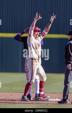February 18, 2024: Wehiwa Aloy #9 Razorback base runner works to extend ...