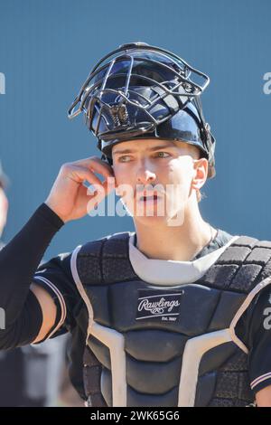 February 18, 2024: Arkansas catcher Hudson White #8 watches as the ...