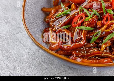 appetizer of pig ears with sauce studio food photo 5 Stock Photo - Alamy
