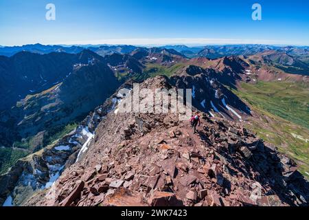 Climbing towards the summit of Maroon Peak in the Maroon Bells-Snowmass ...