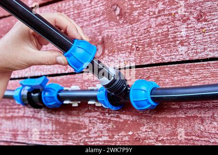 Installation of watering system from HDPE pipes, two parts of water ...