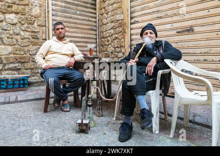 Lebanon, Sour, men smoking shisha Stock Photo - Alamy