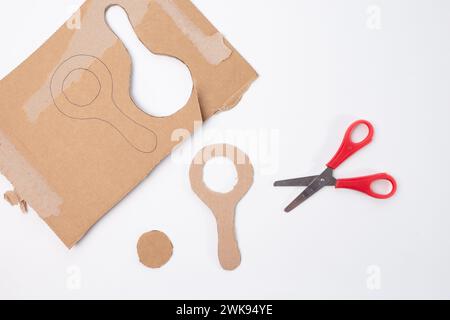 a cardboard magnifying glass craft for kids play, handmade loupe toy ...