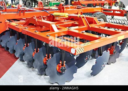 Trailed in-line disc harrow at an agricultural exhibition Stock Photo ...