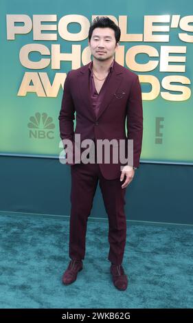 Simu Liu attends the 2024 People's Choice Awards at Barker Hangar on ...