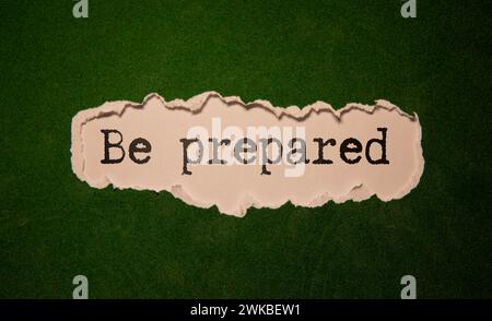 The text 'Be prepared' appearing behind torn green paper. Beautiful ...