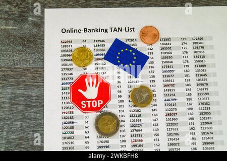 flag of Europe, Euro coins and stop sign with TAN list for online ...