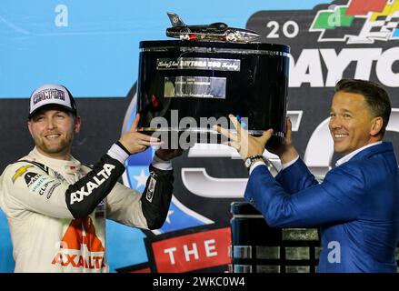 The president of Daytona International Speedway Frank Kelleher greets ...