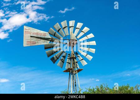 Wind turbine for pumping water, Namibia Stock Photo - Alamy