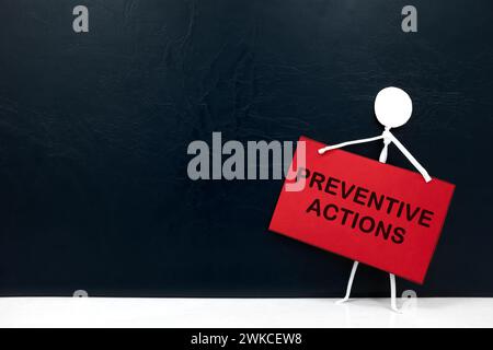 Stick figure holding audit findings placard in black background Stock ...