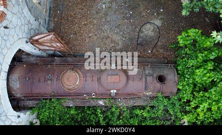 Drone photo of a rusting abandoned OSE Greek Railways steam loco built ...