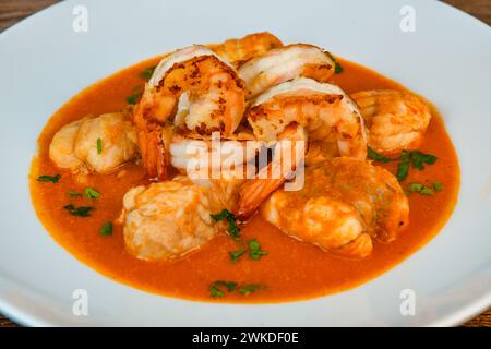 Recipe for Armorican-style monkfish tail, prawns, flambees with cognac ...