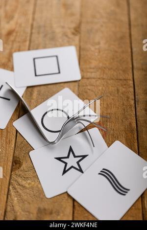 Art of Fork Bending, How to Bend Forks with Your Mind Stock Photo - Alamy