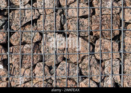 Texture of a gabion wall, steel cages filled with rocks Stock Photo - Alamy