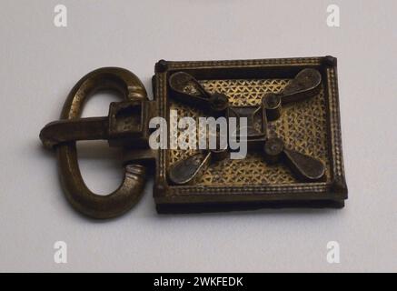 Belt buckle, type I. The rectangular plaque consists of a cast frame ...