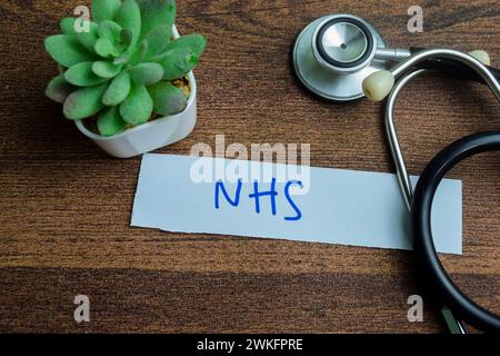 Concept of NHS write on sticky notes with stethoscope isolated on ...